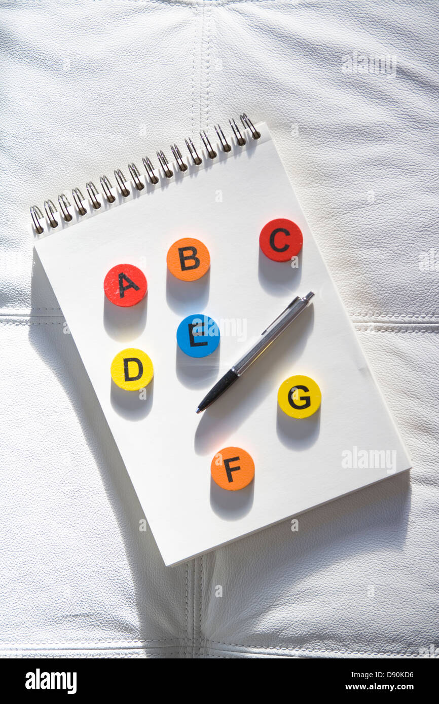 Letters on a notebook Stock Photo - Alamy