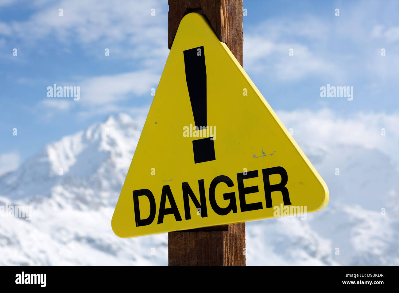 A warning sign on a ski slope in the alps Stock Photo - Alamy