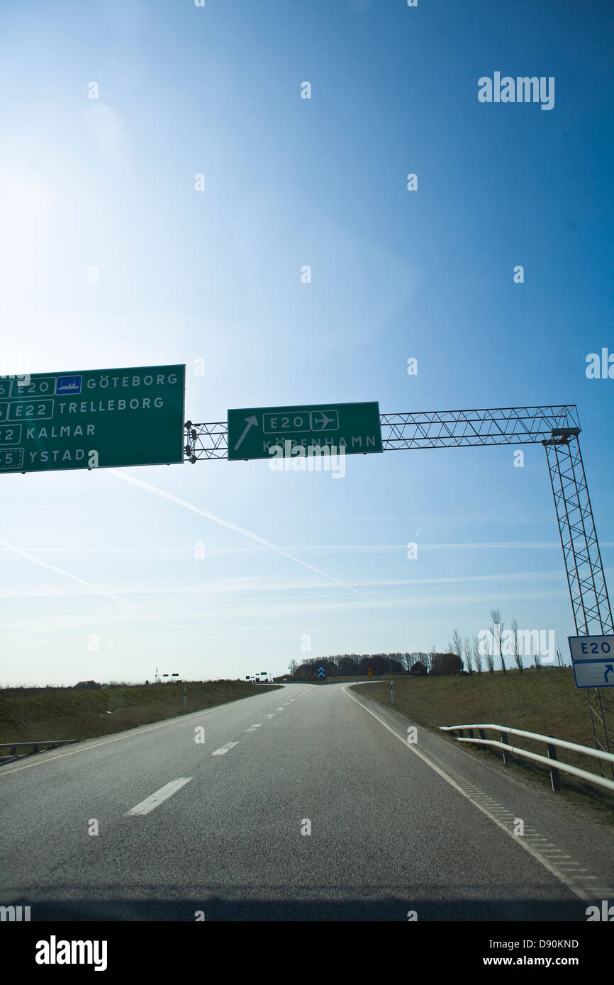 Road signs over motorway Stock Photo - Alamy