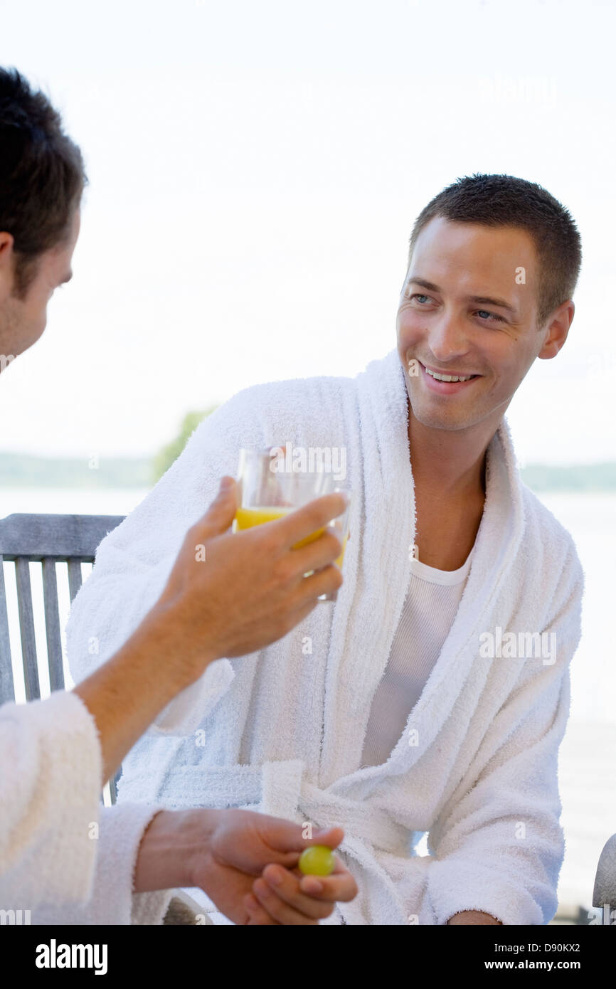 Two men having breakfast Stock Photo - Alamy