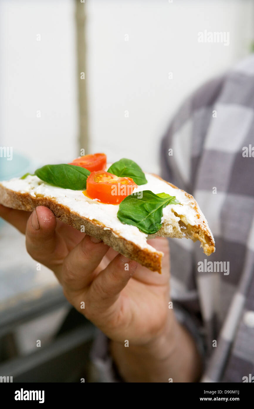 A man eating a sandwich Stock Photo - Alamy