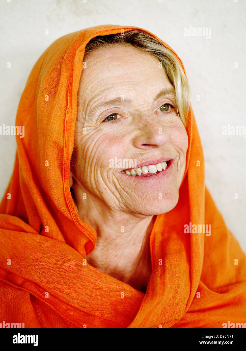 Old woman wearing scarf hi-res stock photography and images - Alamy