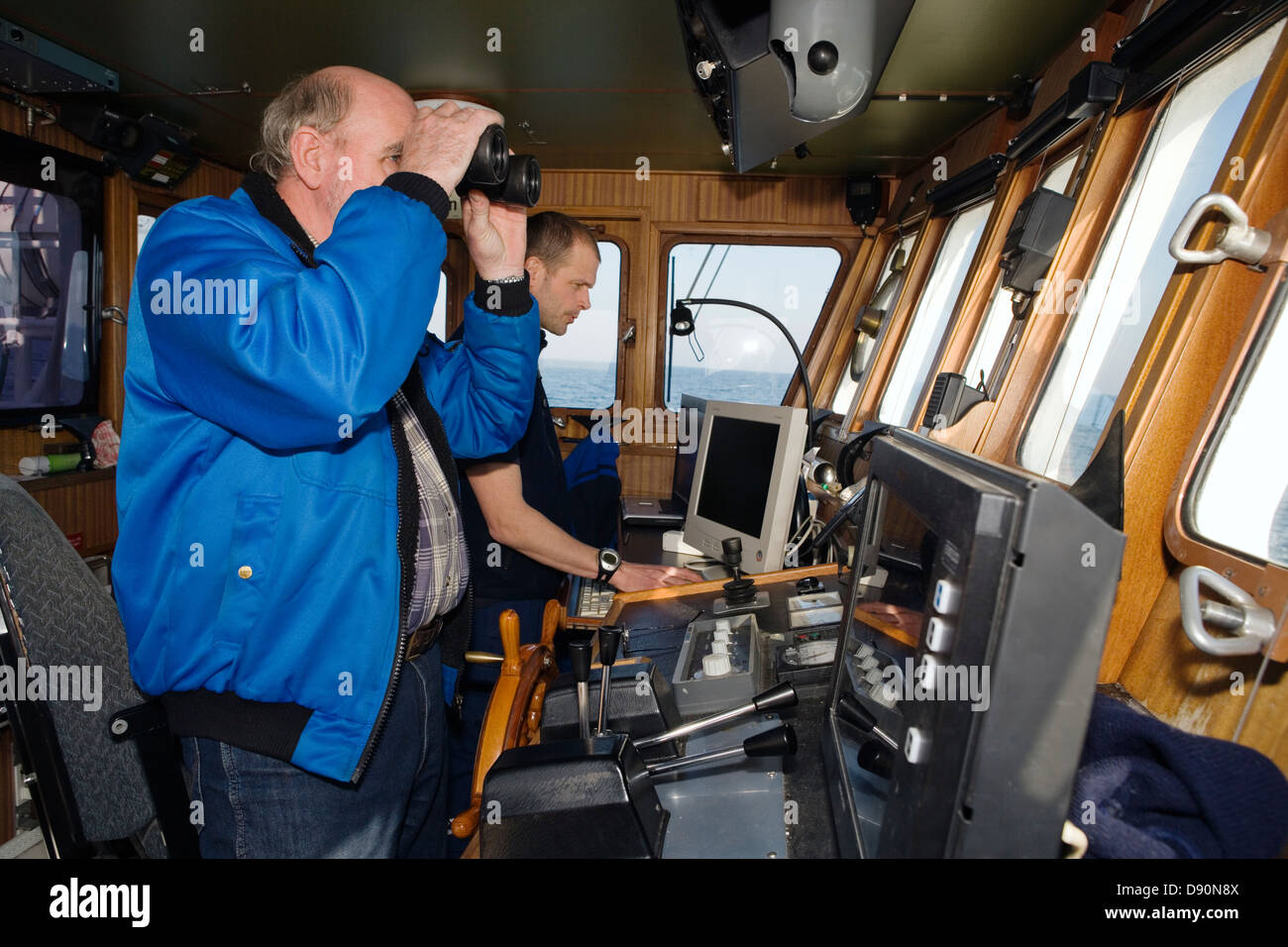 Ship two men hi-res stock photography and images - Alamy