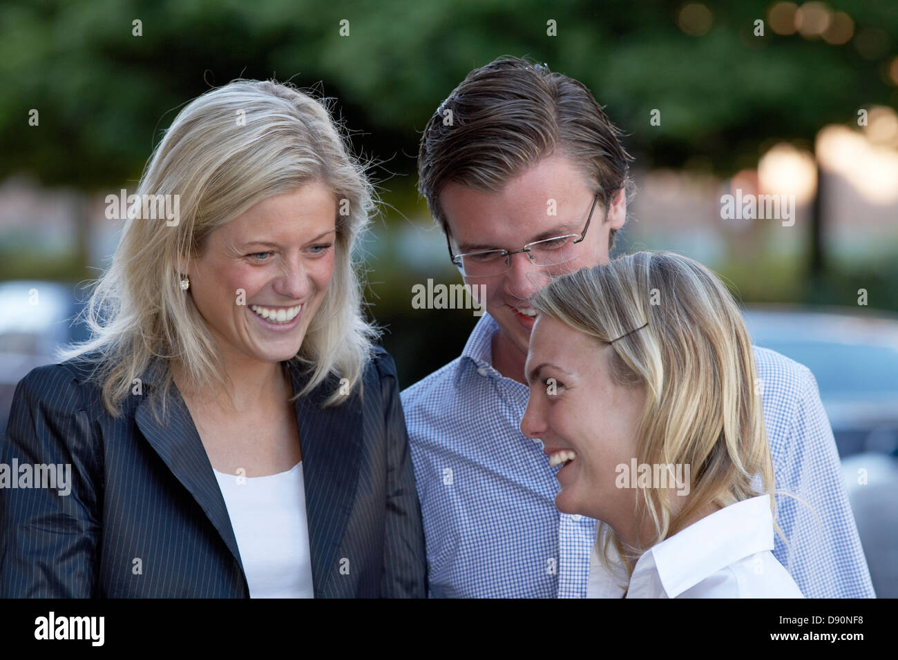 Three friends talking, Sweden Stock Photo - Alamy