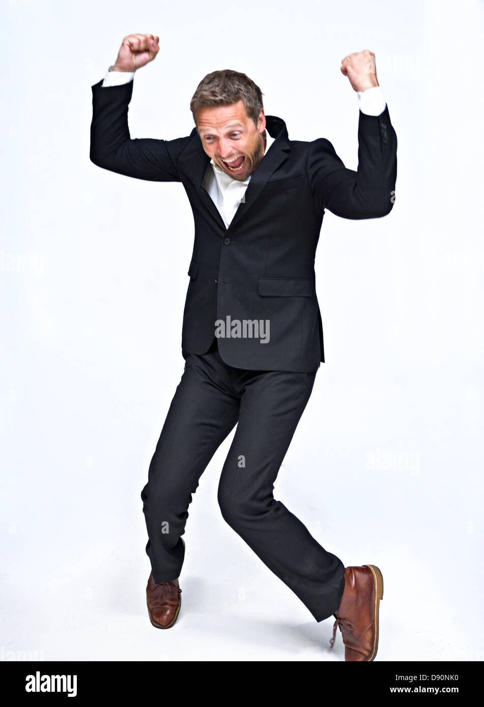 Businessman dancing and screaming Stock Photo - Alamy
