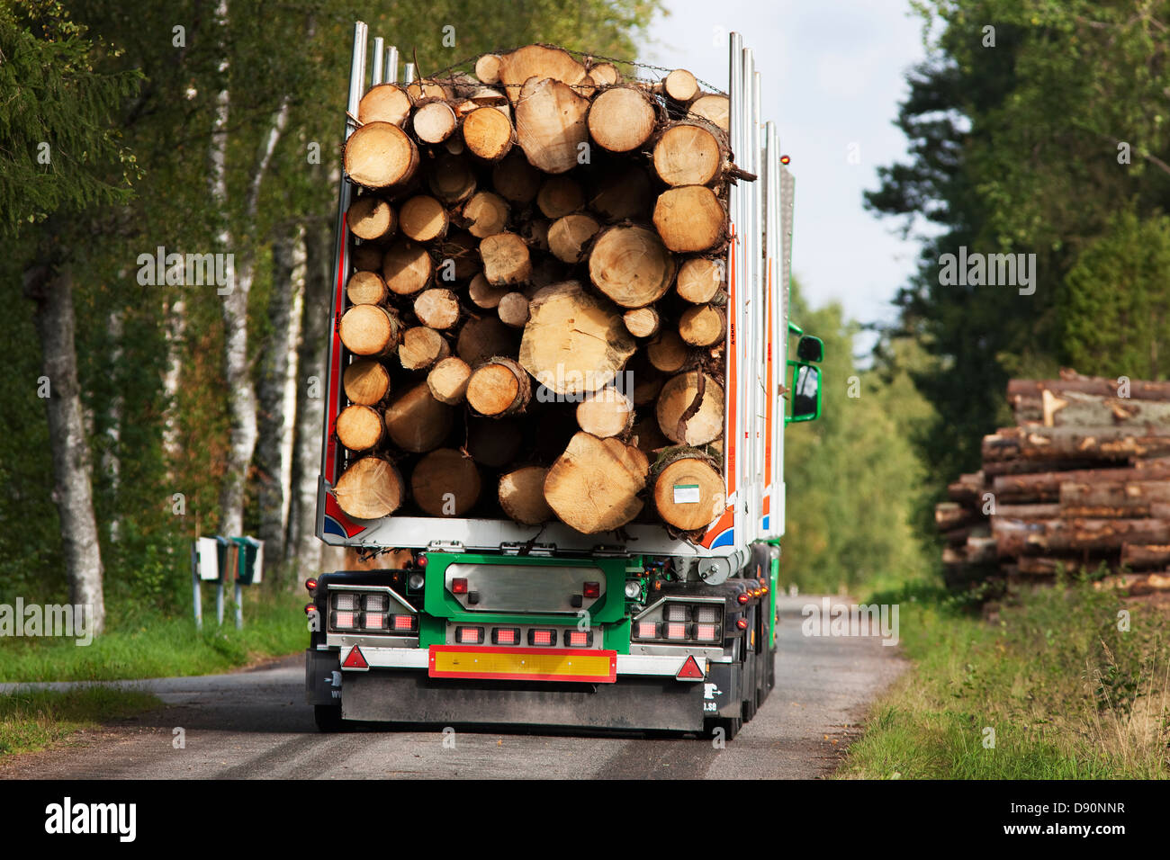 Truck carrying timber Stock Photo - Alamy