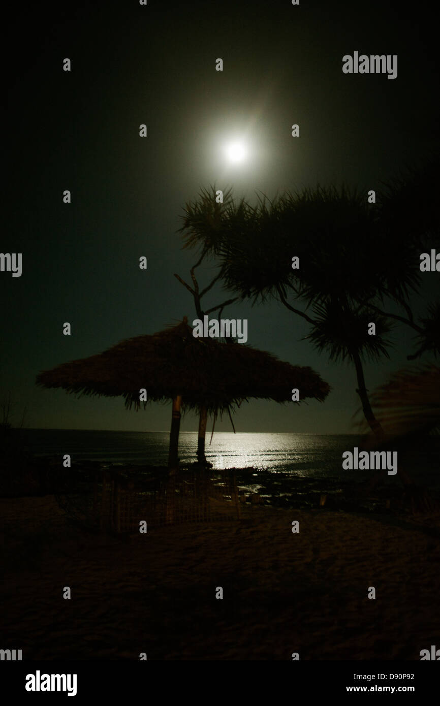Full moon over beach Stock Photo - Alamy