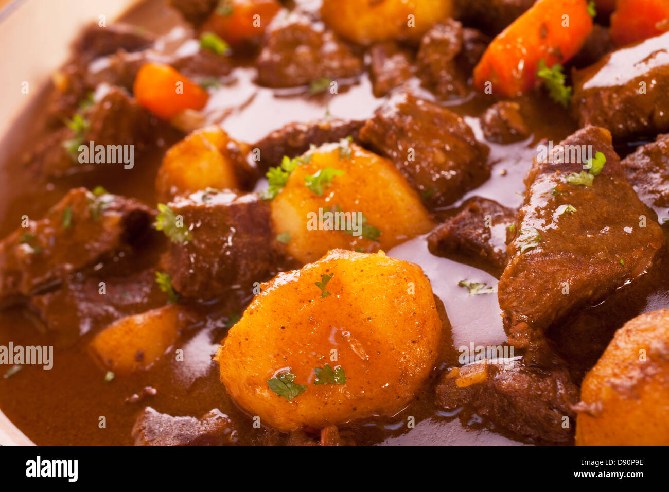 Stew with Carrots and Potatoes - a simple stew in a cast iron pot, with ...