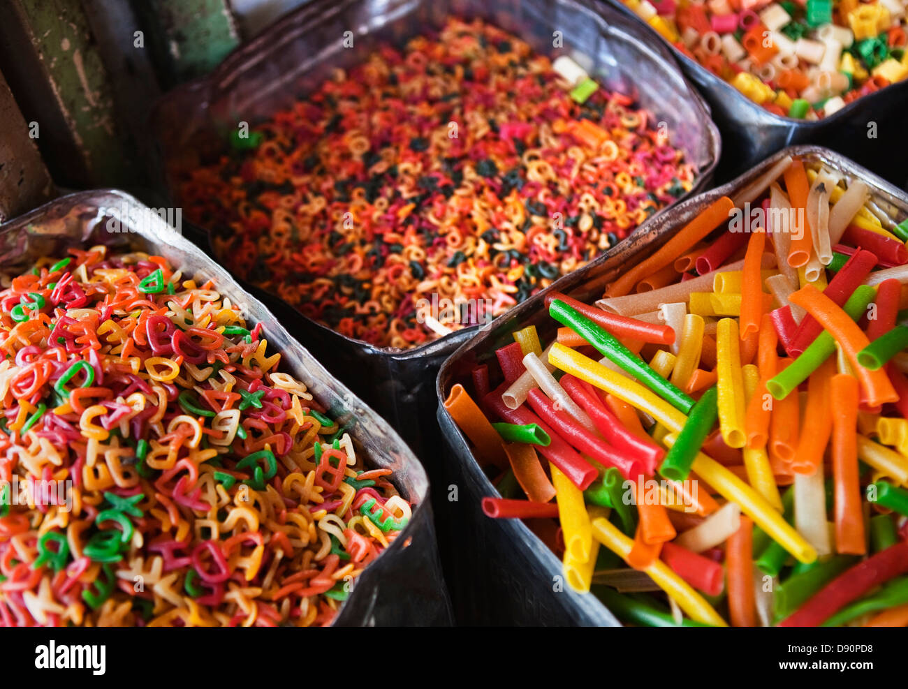 Multicolored pasta on market stall Stock Photo - Alamy