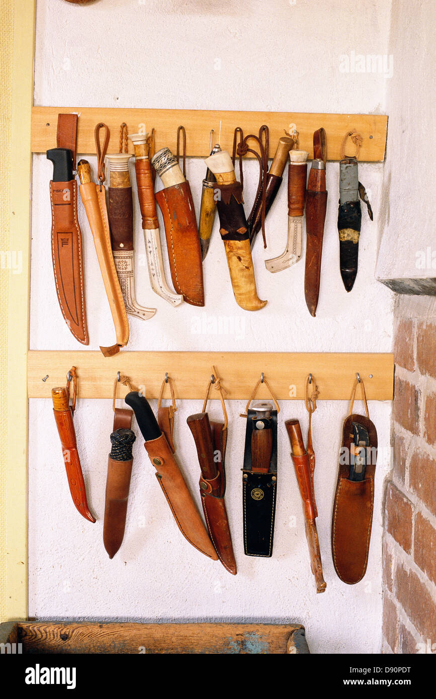 Knives hanging on wall Stock Photo - Alamy
