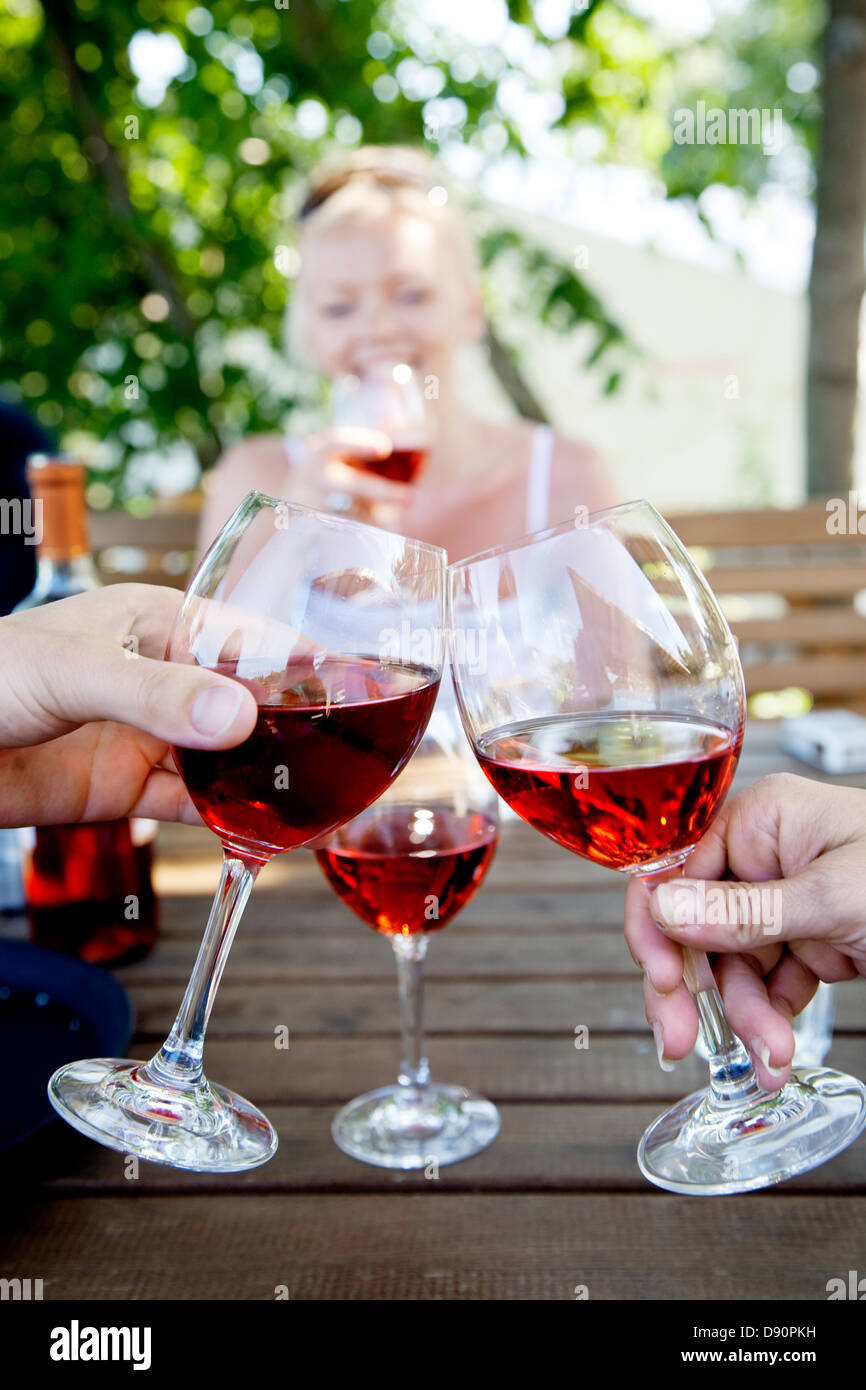 Four people hands toasting hi-res stock photography and images - Alamy