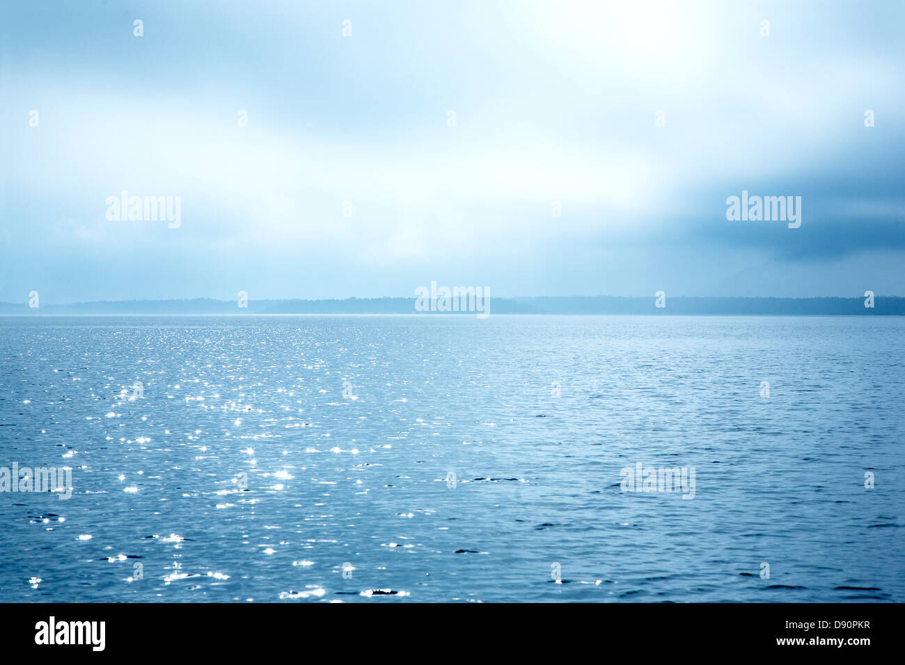 Sunlight reflecting in sea Stock Photo - Alamy