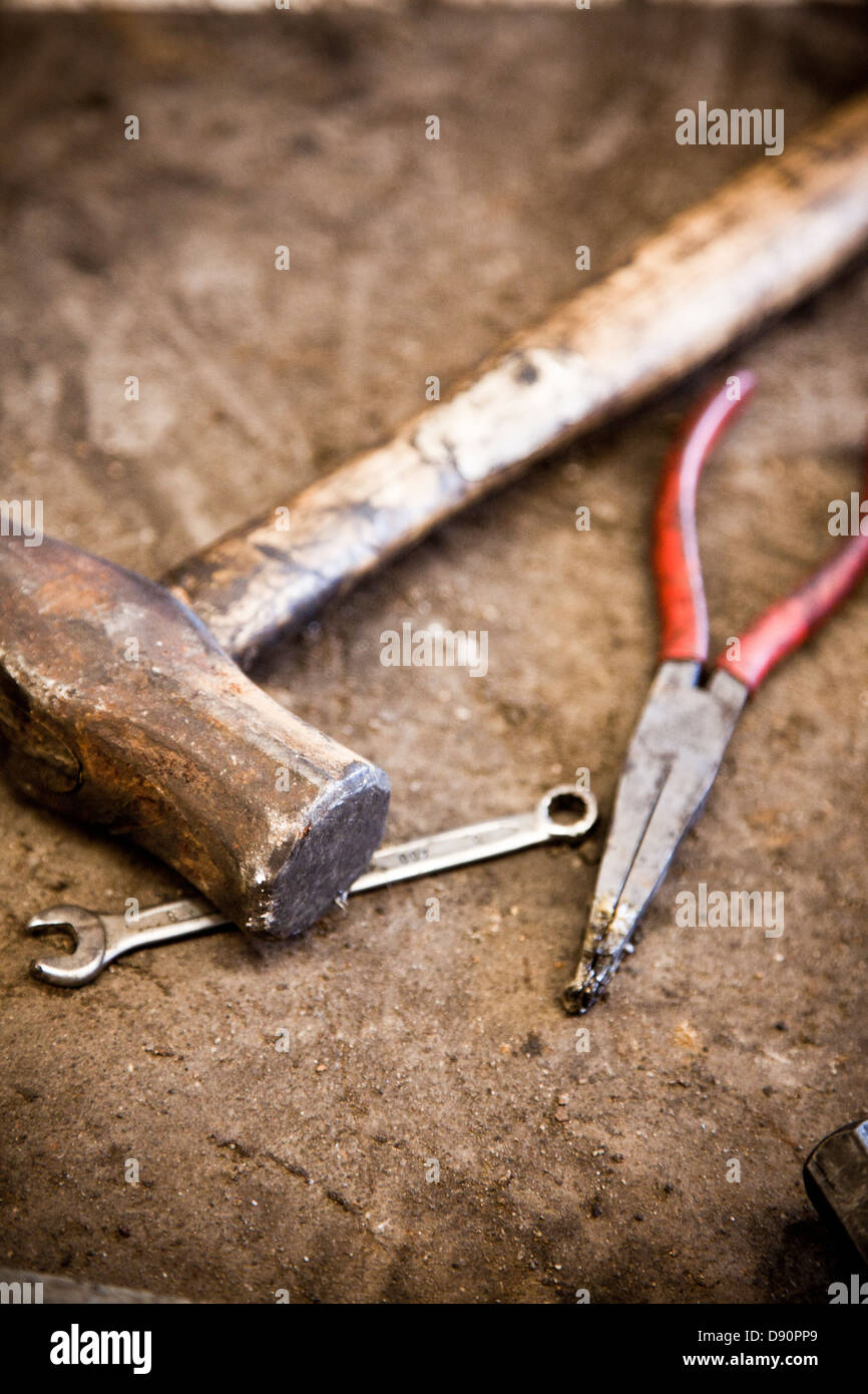 Rusted tools on ground Stock Photo - Alamy