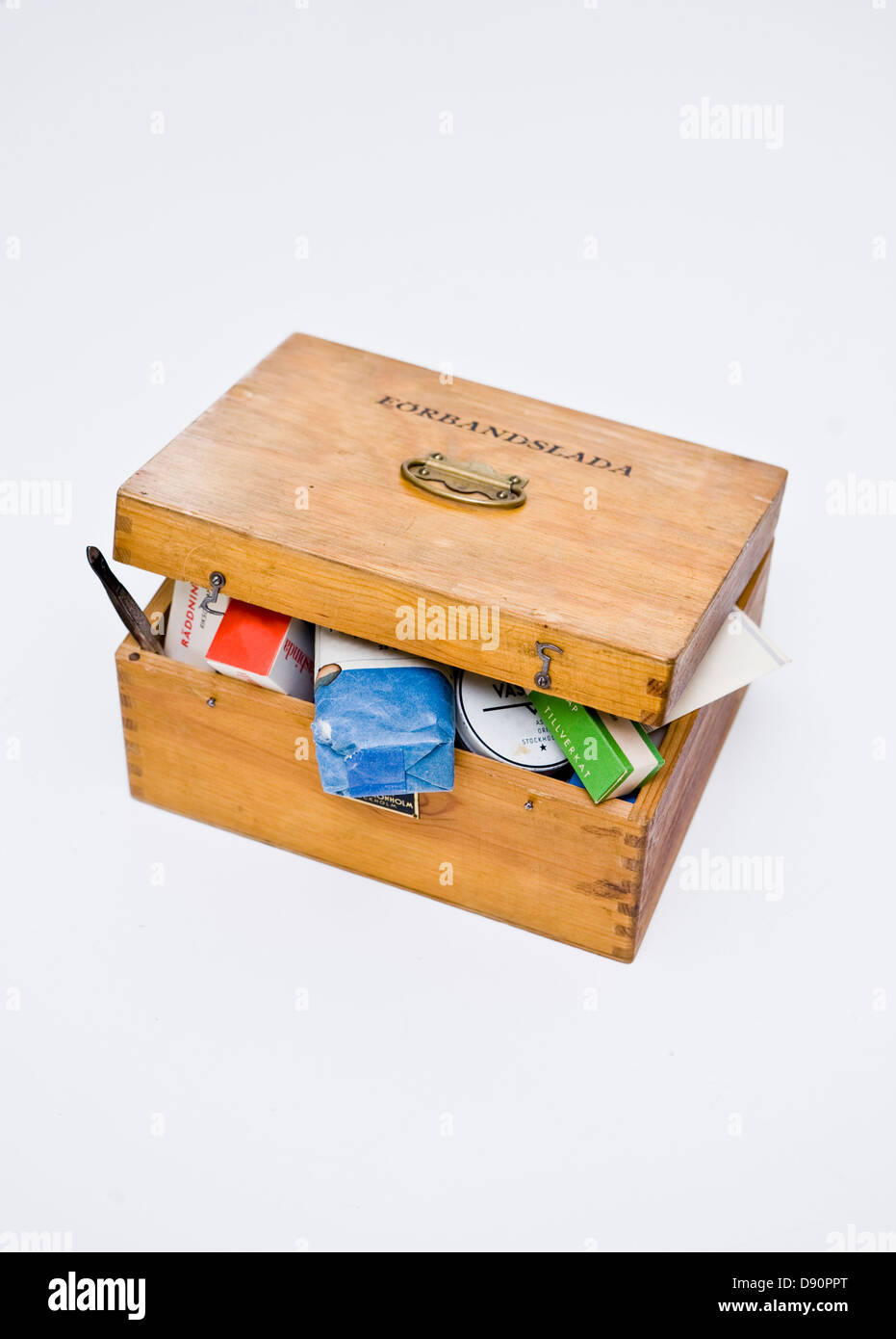 Wooden medicine box against white background Stock Photo - Alamy