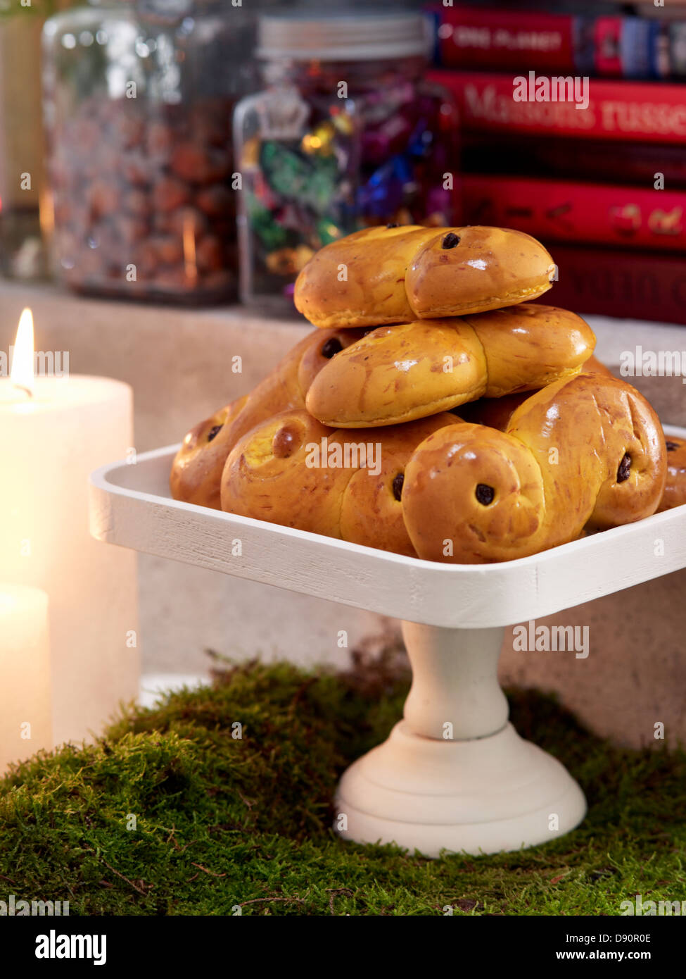 Saffron rolls on dessert stand, close-up Stock Photo - Alamy