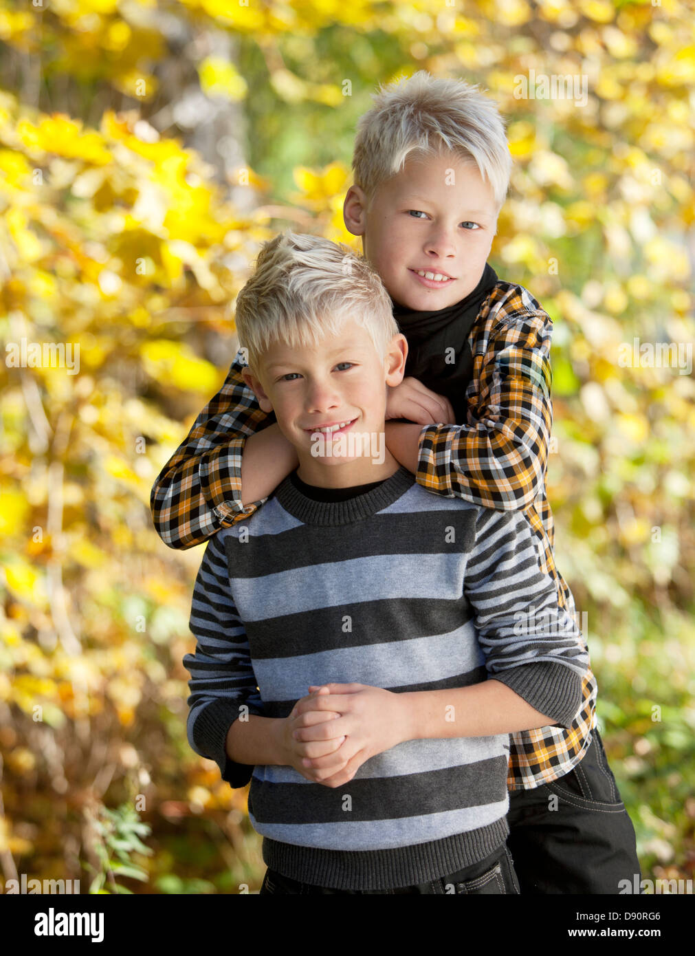Boys standing outside hi-res stock photography and images - Alamy