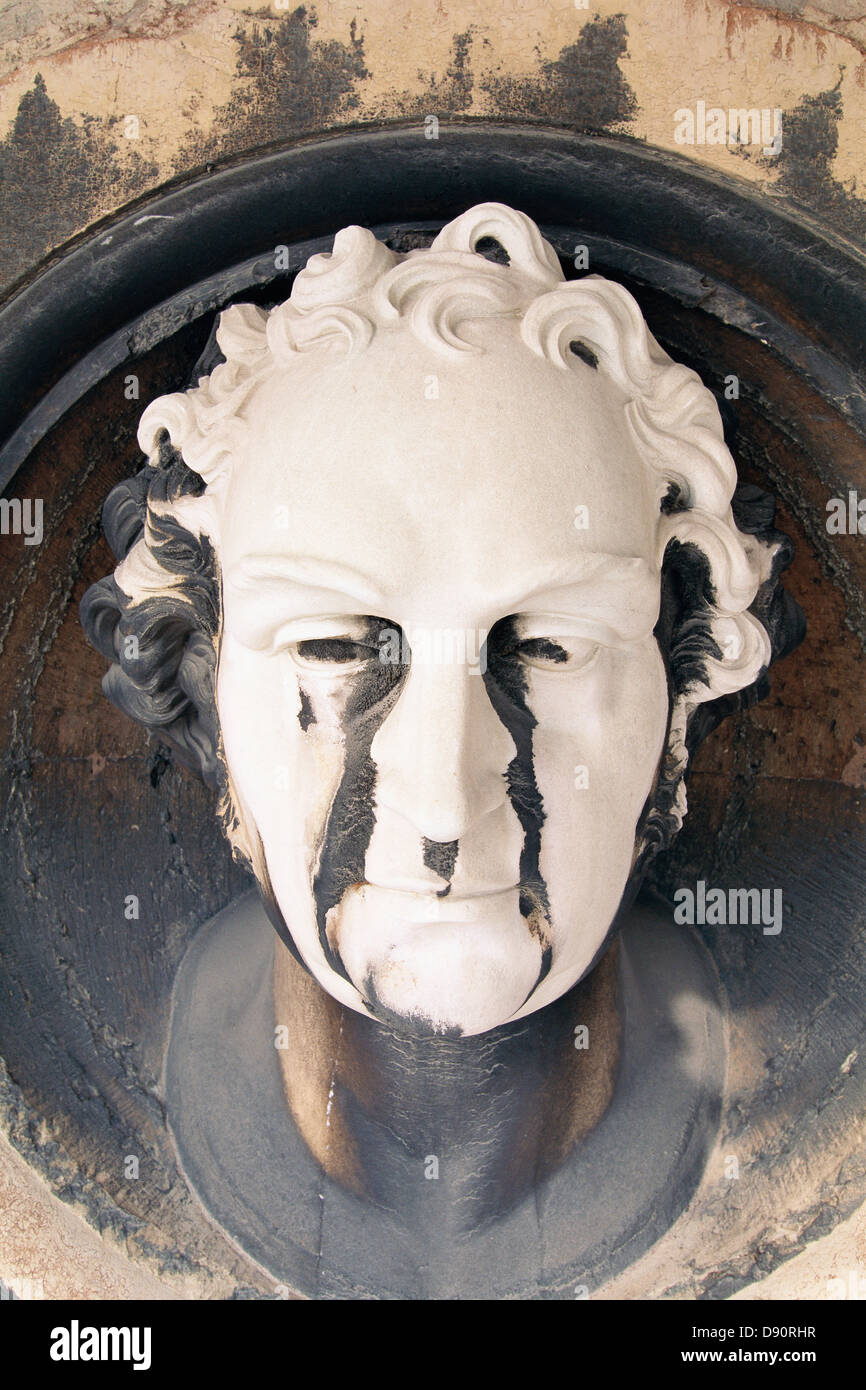 Statue of weathered human figure Stock Photo - Alamy