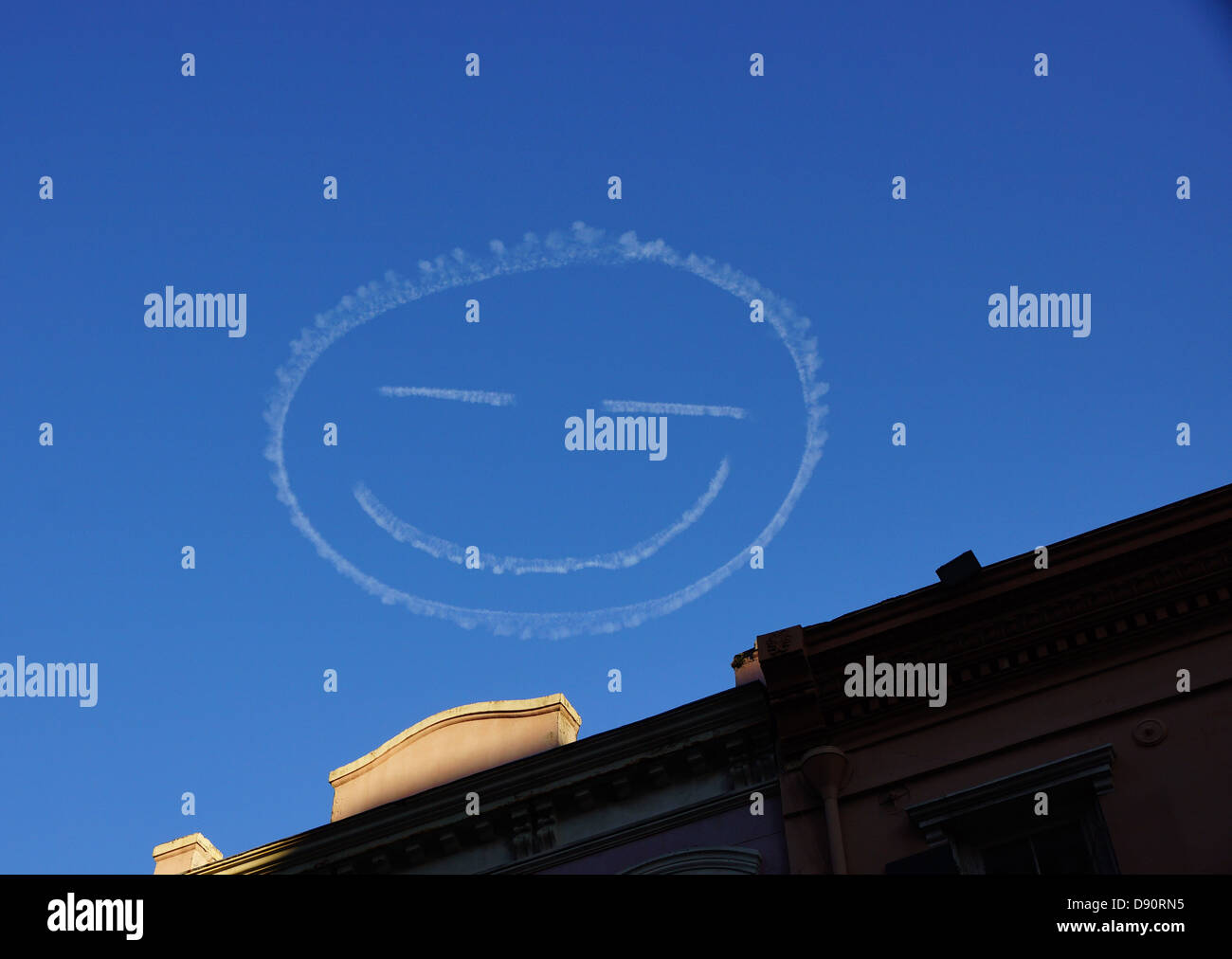 Skywriting created smiley face Stock Photo - Alamy