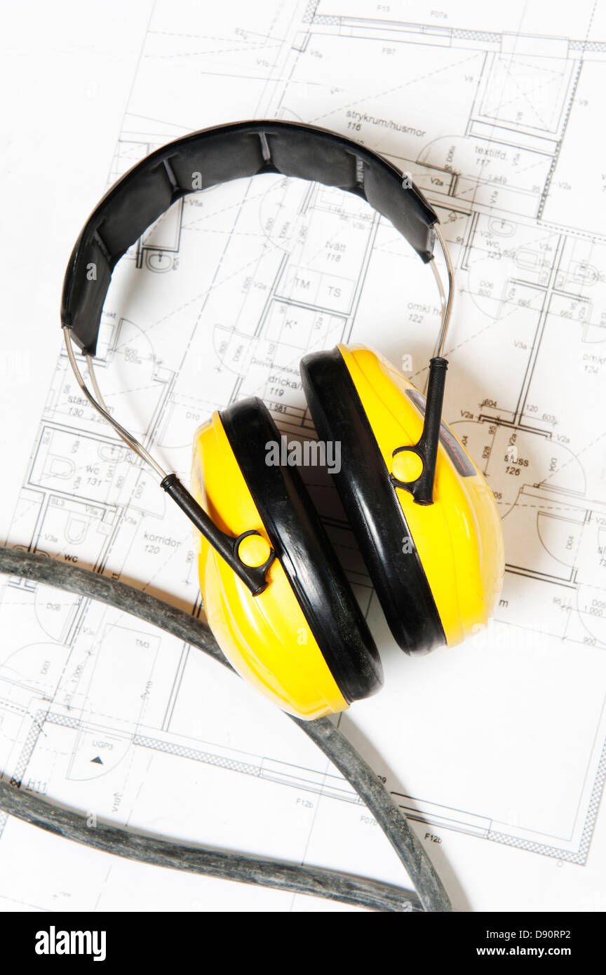 Pair of yellow ear defenders Stock Photo - Alamy