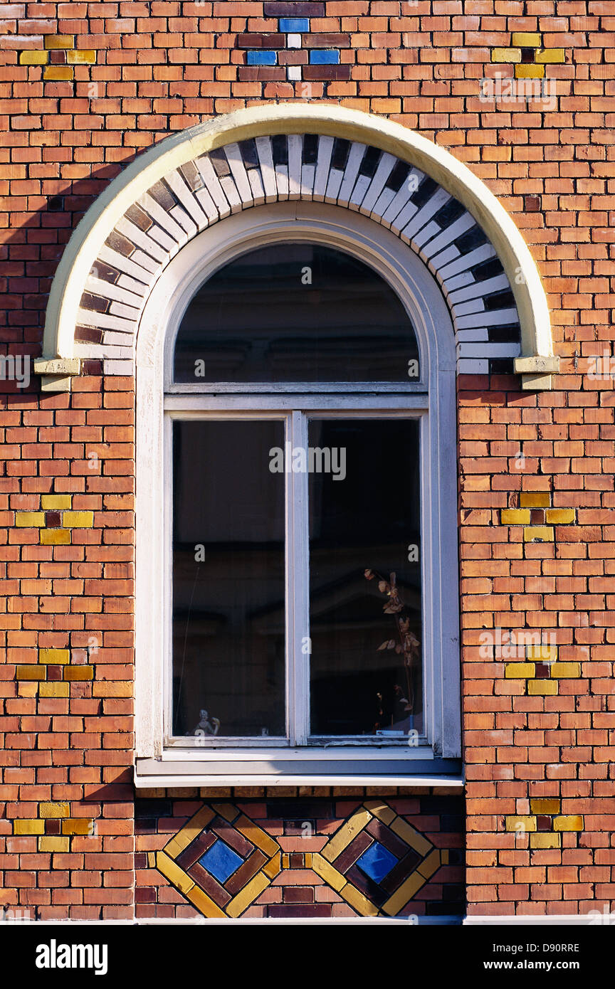 Arched window on bricked wall Stock Photo - Alamy