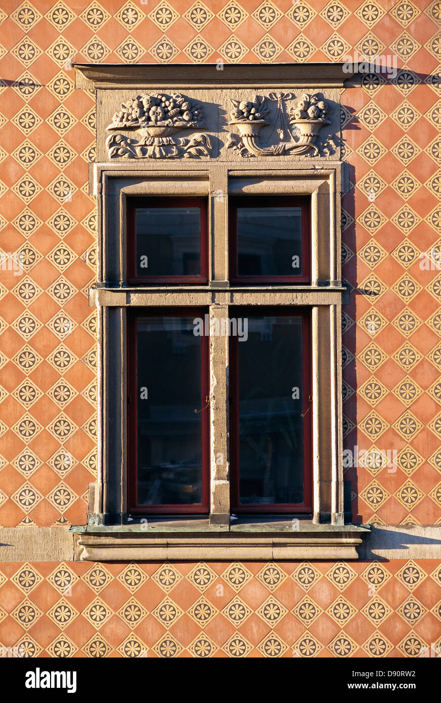 Sculpture above window Stock Photo - Alamy