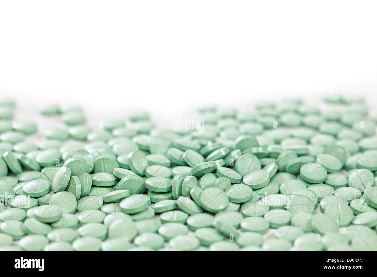 Tablets Background - green tablets on white background with copy space ...
