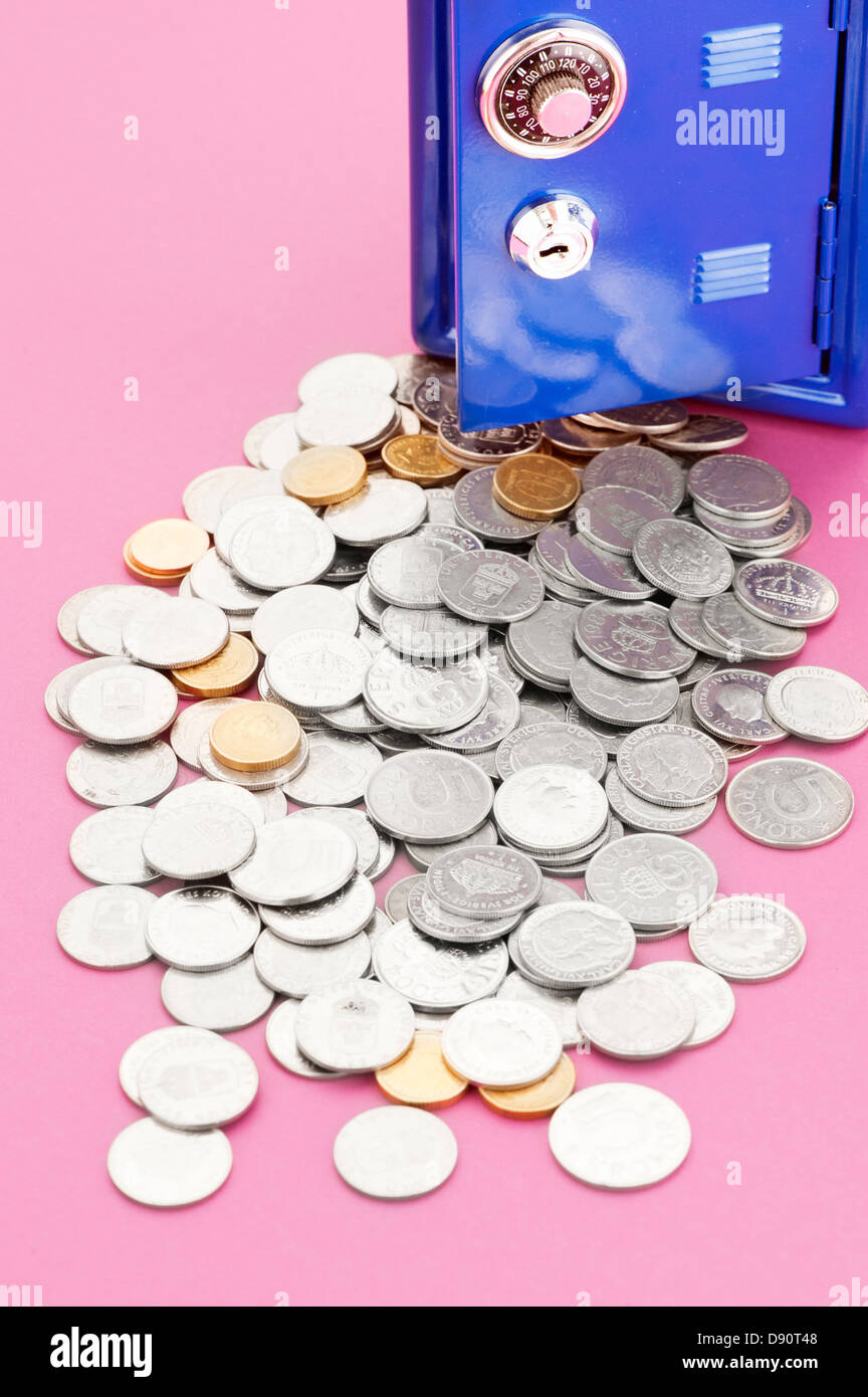 A safe with coins Stock Photo - Alamy