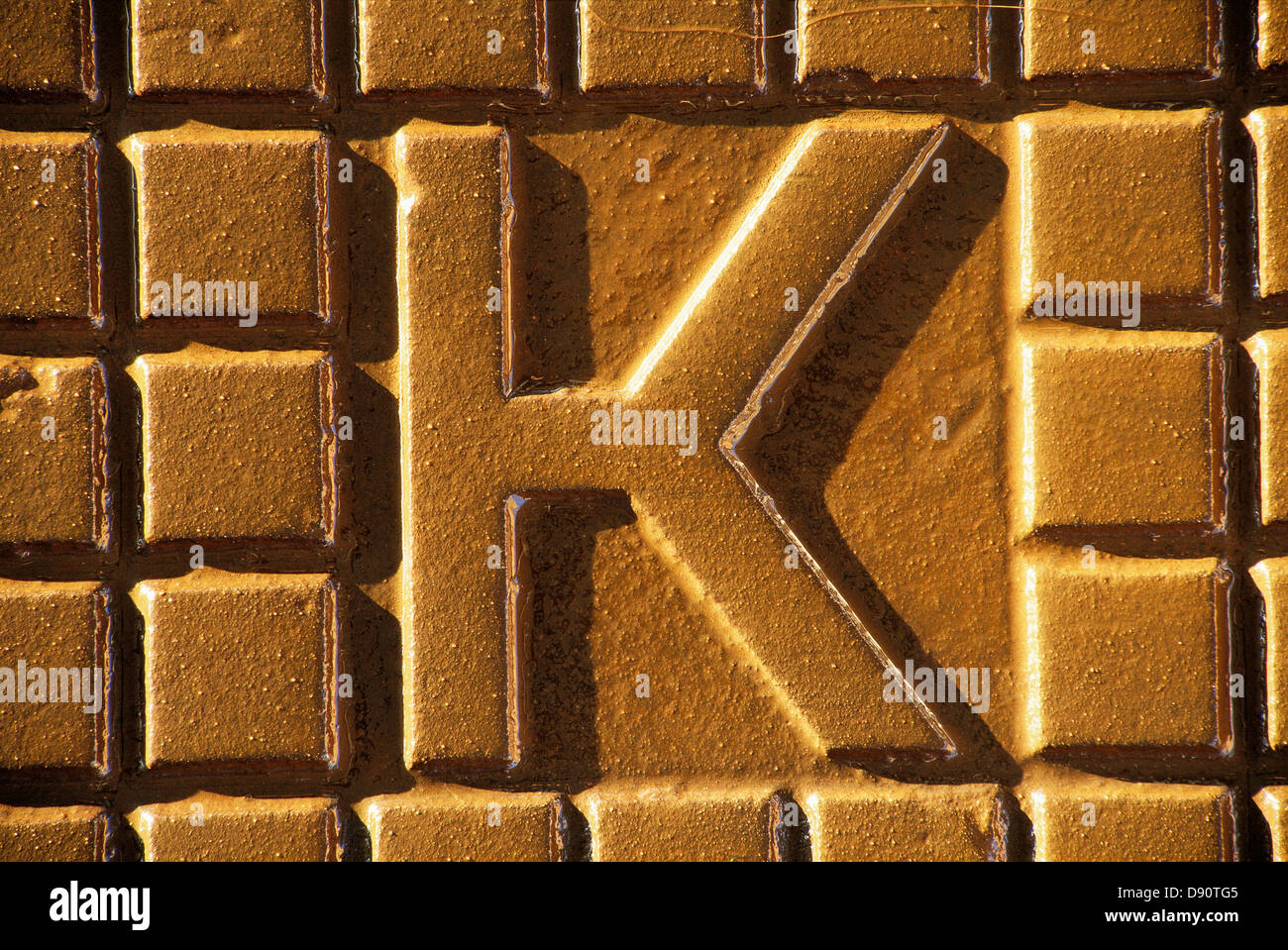 Alphabet embossed amid blocks Stock Photo - Alamy