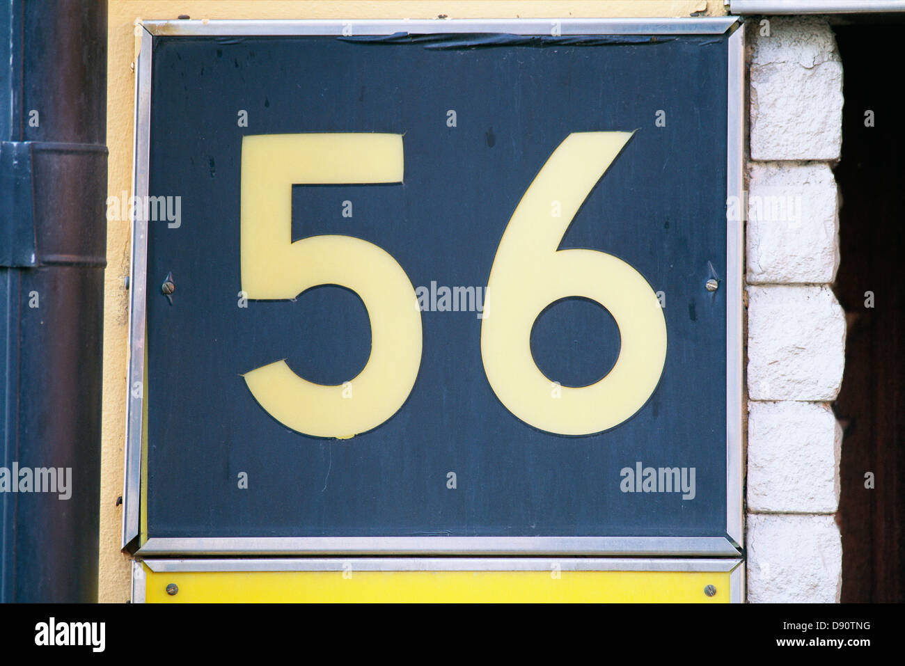 Number plate hanging on wall Stock Photo - Alamy