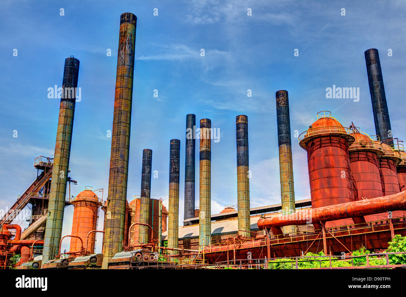 Smoke stacks of an old factory Stock Photo - Alamy