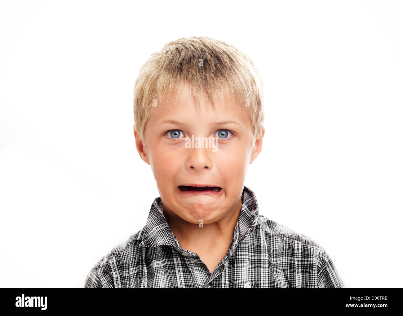 Portrait of boy making face, studio shot Stock Photo - Alamy
