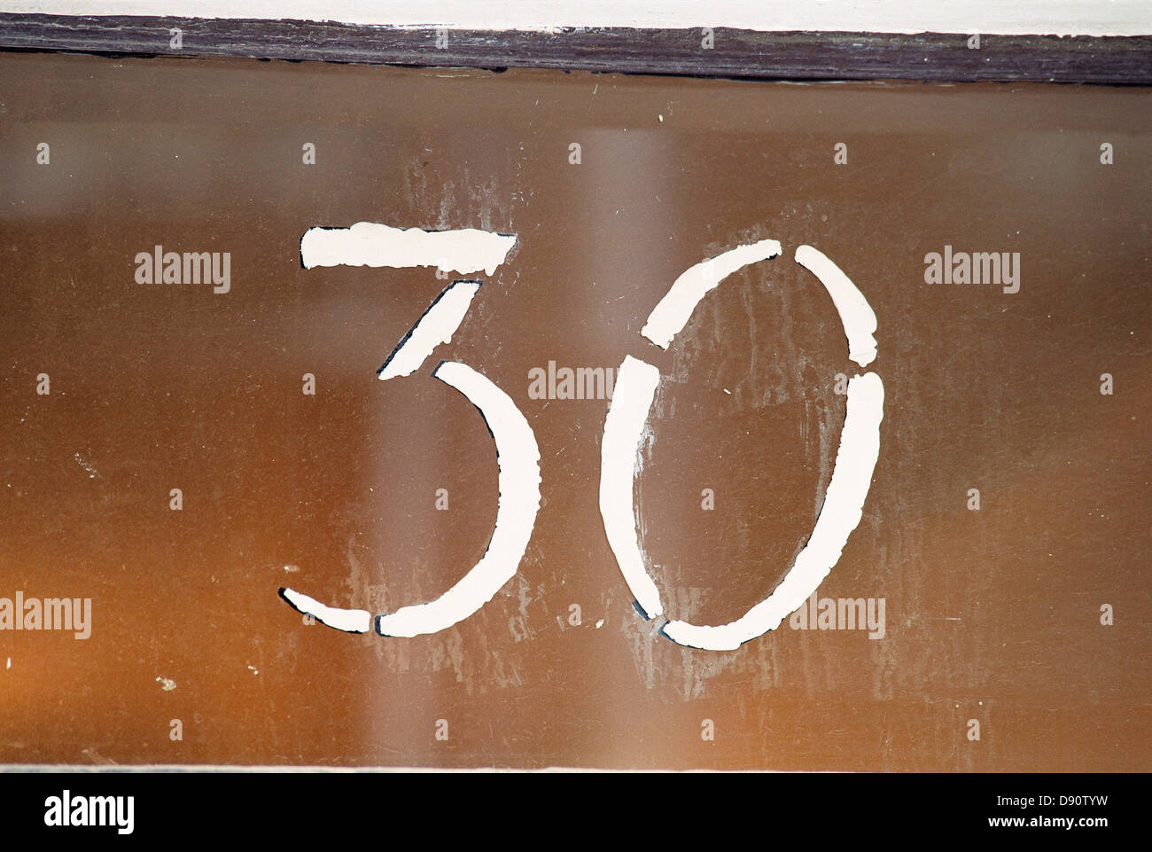 Number on wall Stock Photo - Alamy