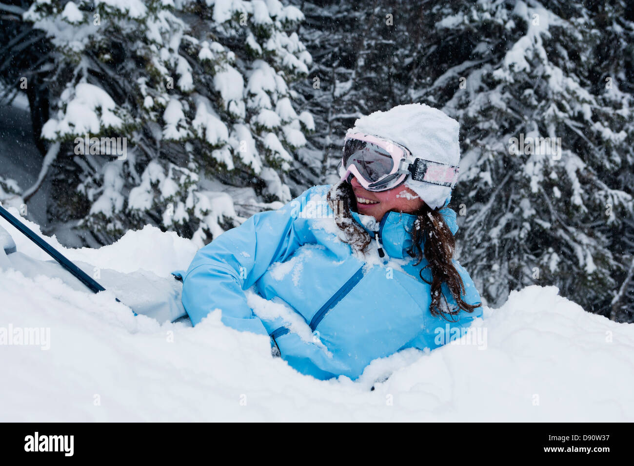 Female skier lying in snow hi-res stock photography and images - Alamy
