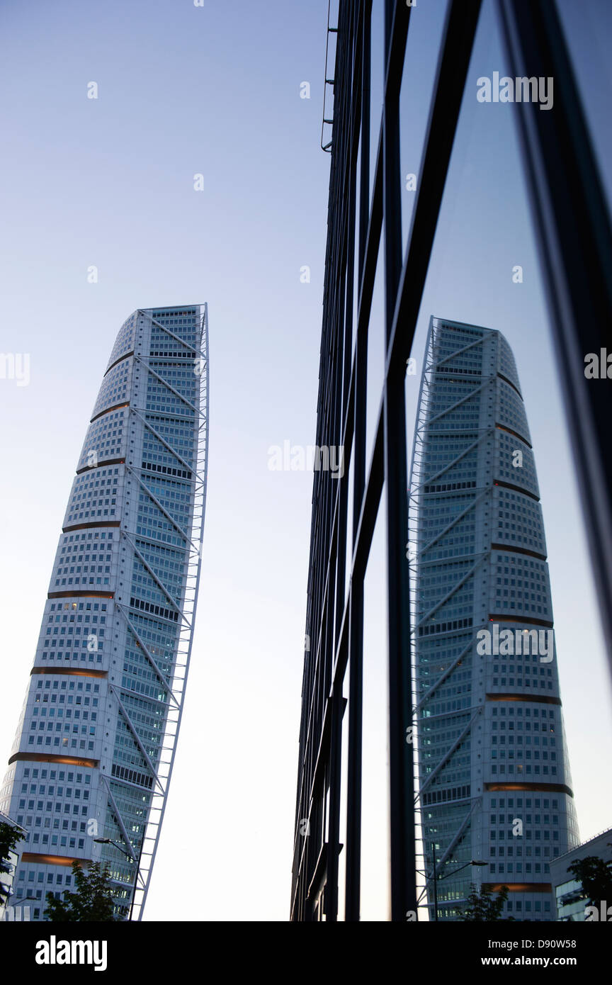 Turning Torso building reflected in glass facade Stock Photo - Alamy