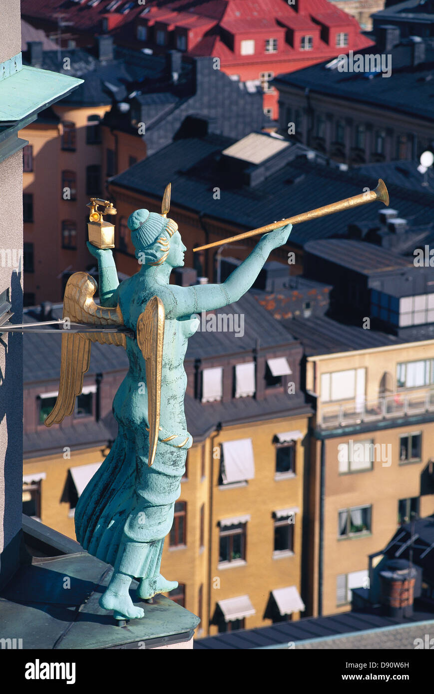 Statue with buildings in background Stock Photo - Alamy