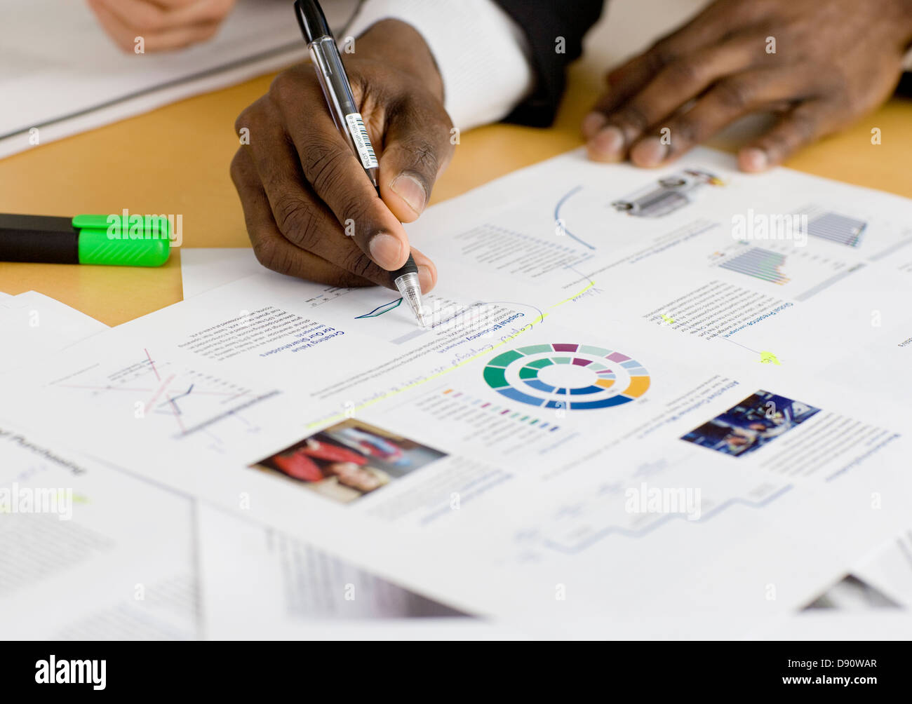 Hands writing notes on document, close-up Stock Photo - Alamy