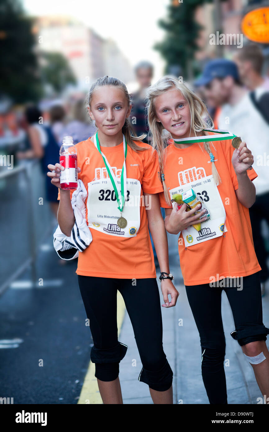 Smiling girls with medals Stock Photo - Alamy