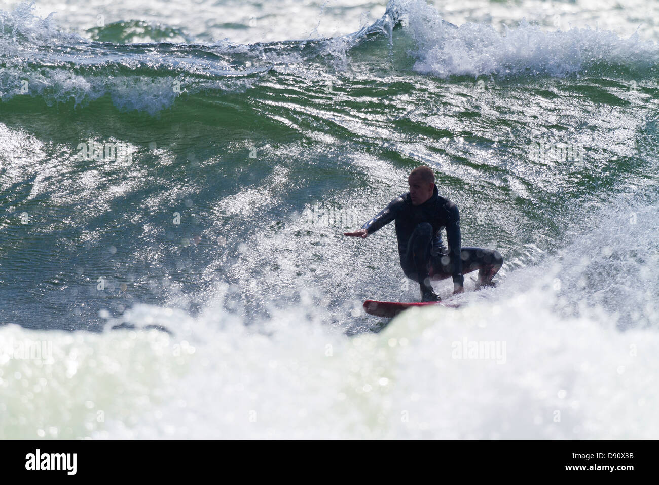 Male surfer on wave Stock Photo - Alamy