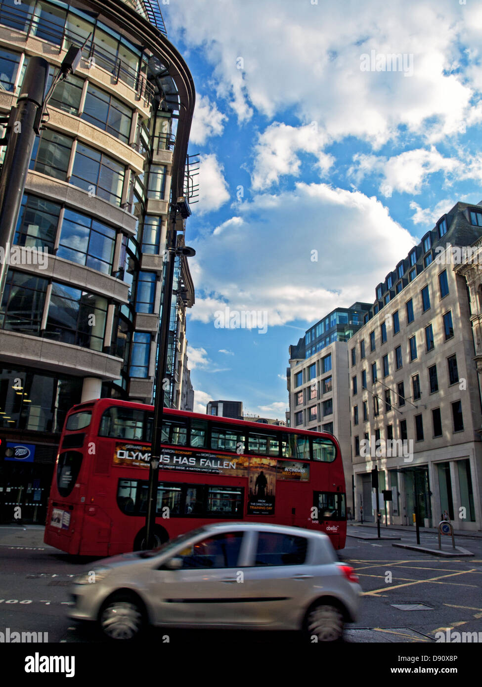 Modern architecture in the City of London showing red double-decker bus ...