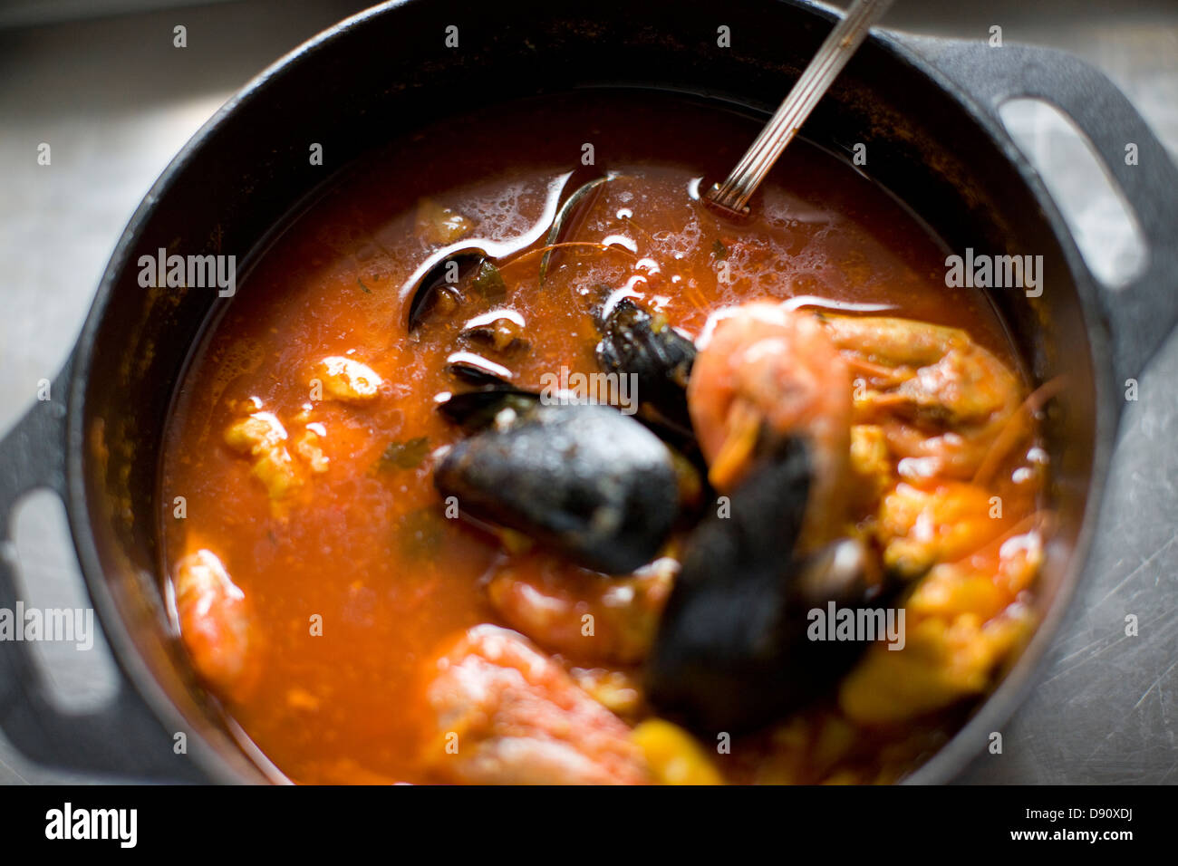 Pot with fish soup Stock Photo - Alamy