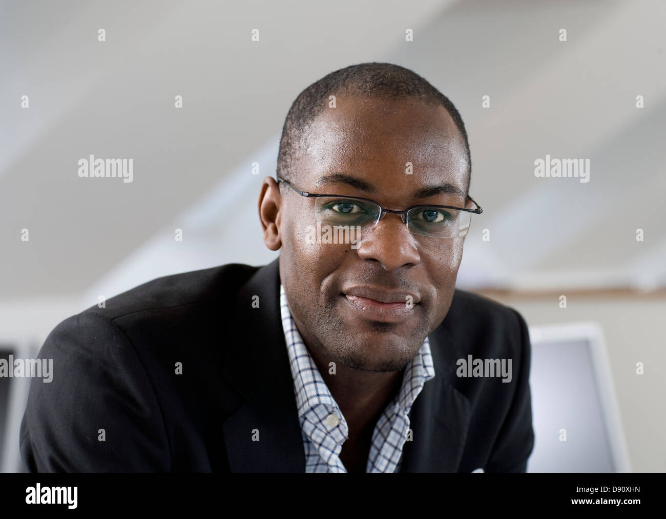 Portrait of man in office Stock Photo - Alamy