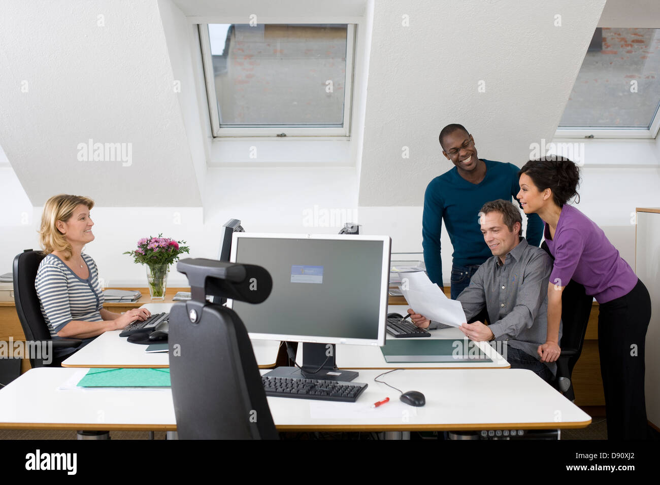 People working together in office Stock Photo - Alamy