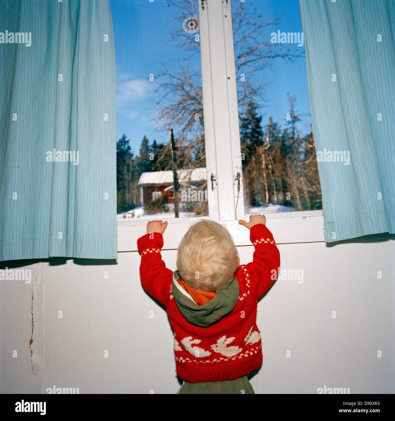 A girl by a window, Sweden Stock Photo - Alamy