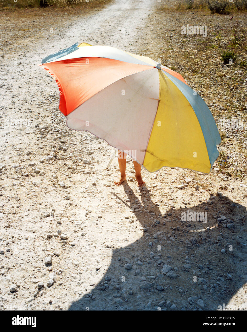 A child under a parasol, Sweden Stock Photo - Alamy