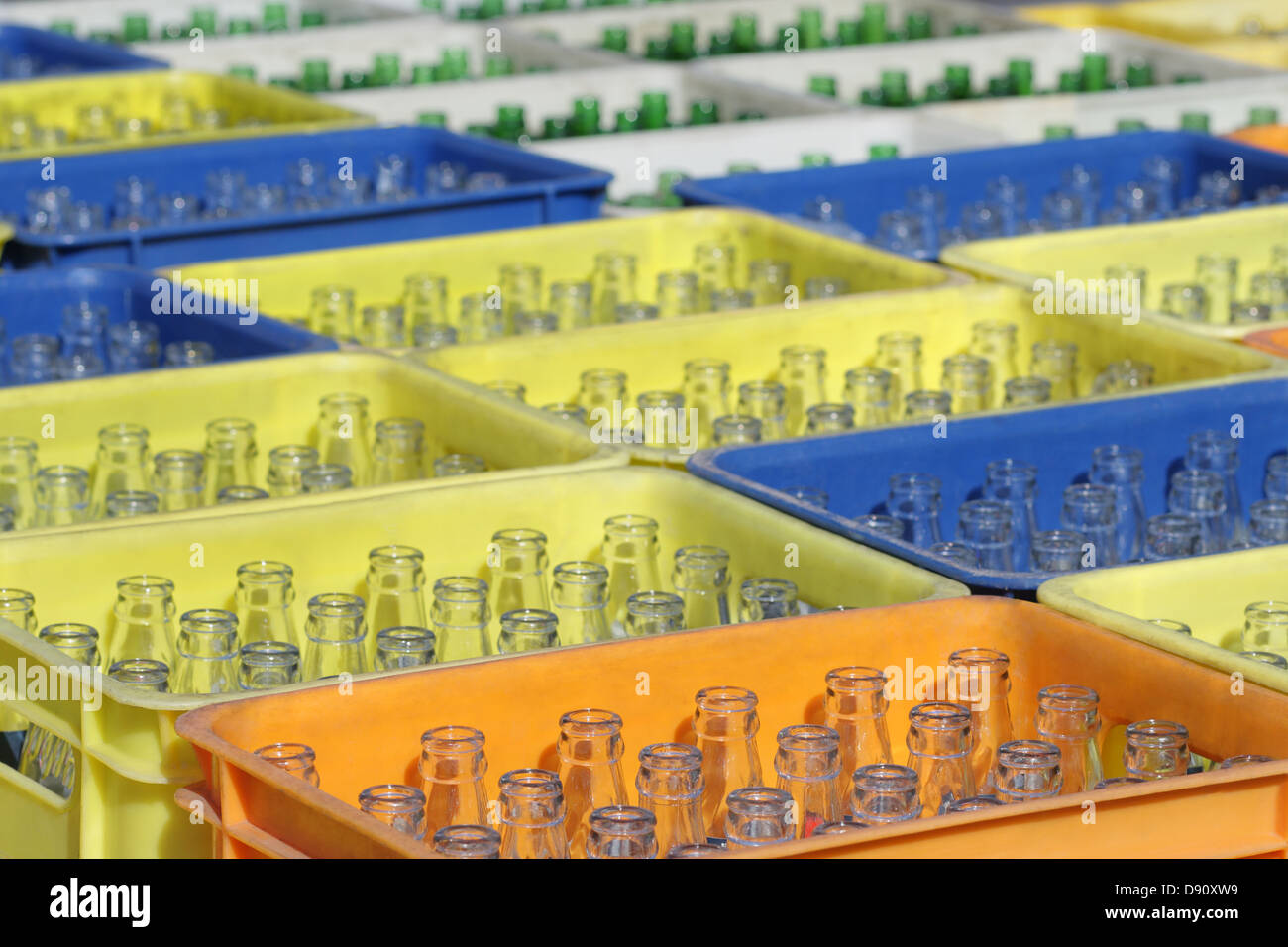 Bunch of empty glass bottle crates Stock Photo - Alamy