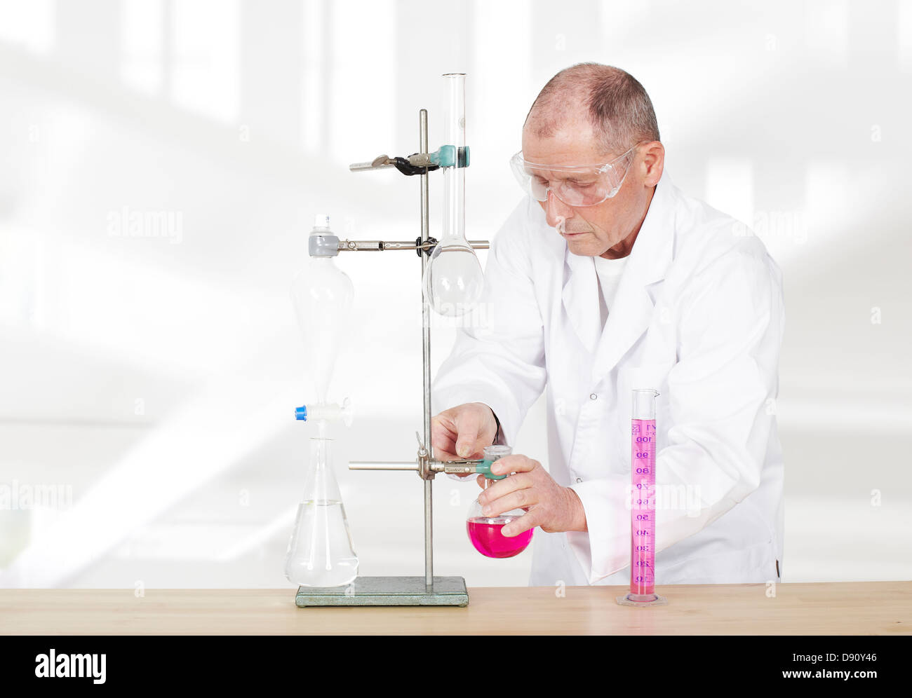 Scientist working with beaker in laboratory Stock Photo - Alamy