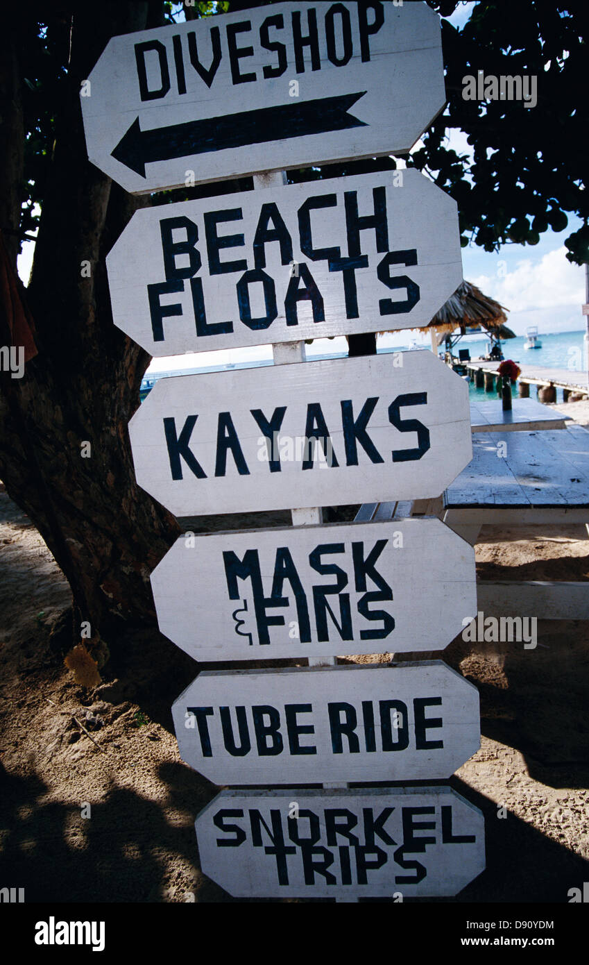 Sign showing a variety of activities for tourists, Fiji Stock Photo - Alamy