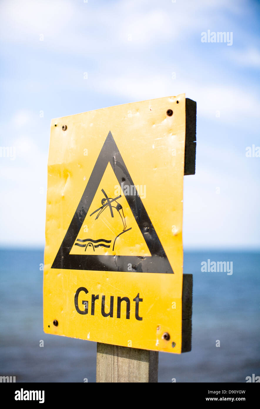 A warning sign by the water, Gotland, Sweden Stock Photo - Alamy