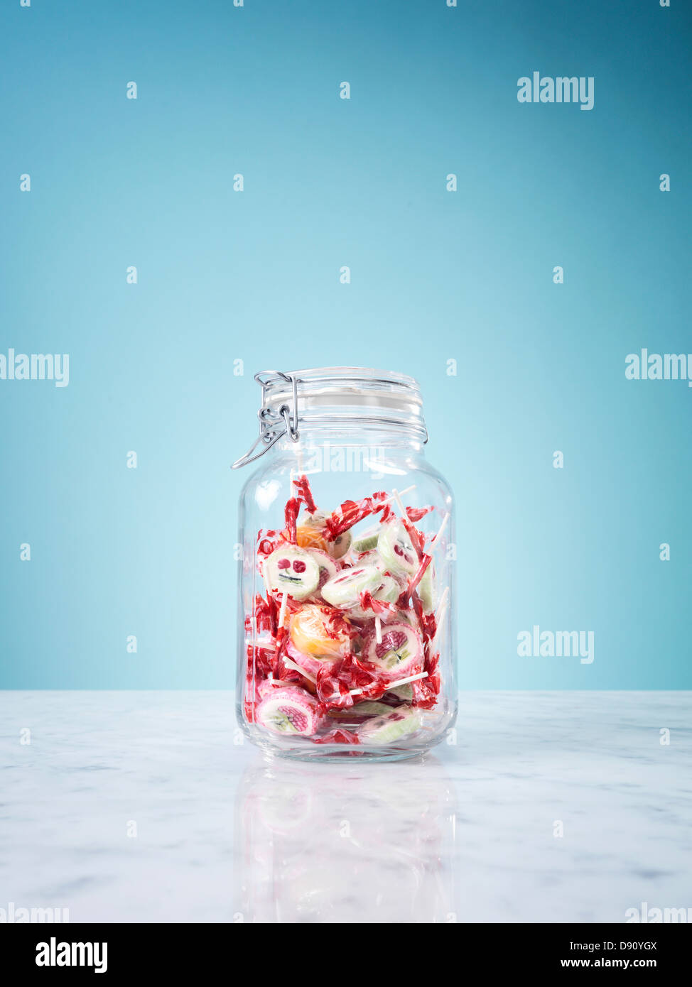 Small lollipops in jar Stock Photo - Alamy