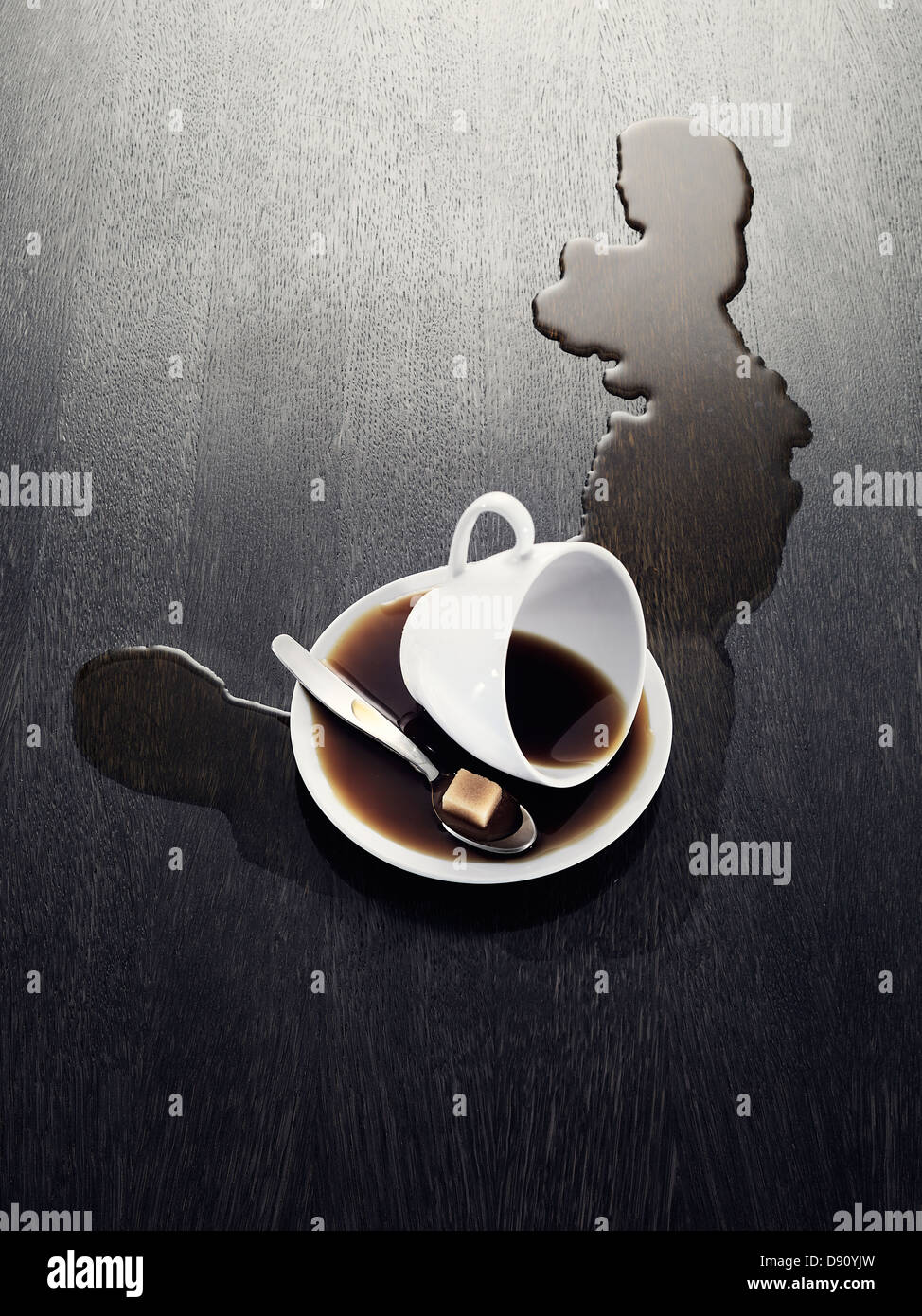 Cup with spilled coffee Stock Photo - Alamy